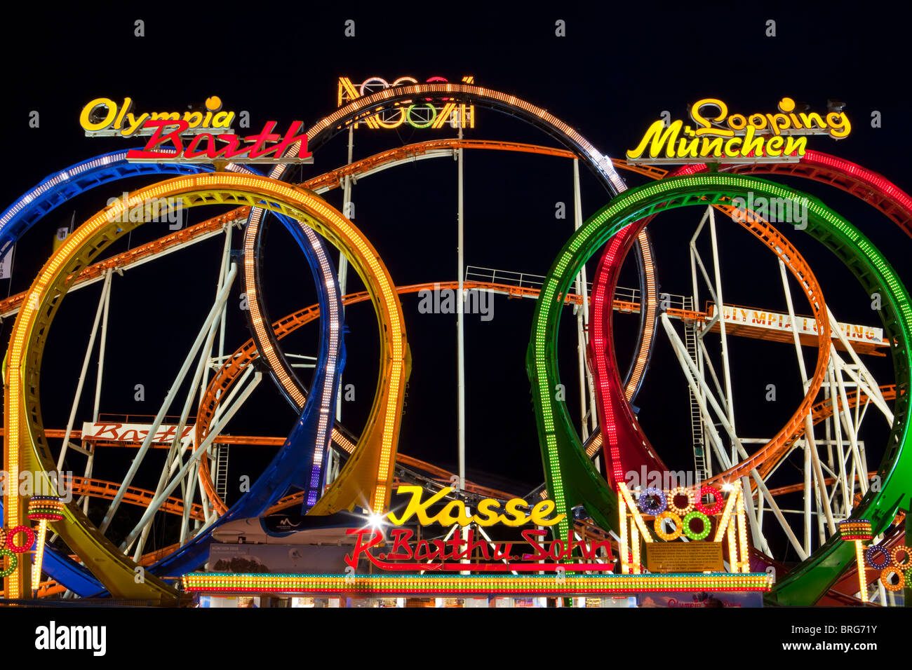 Roller coaster lit up at night at the Oktoberfest, Munich Stock Photo ...