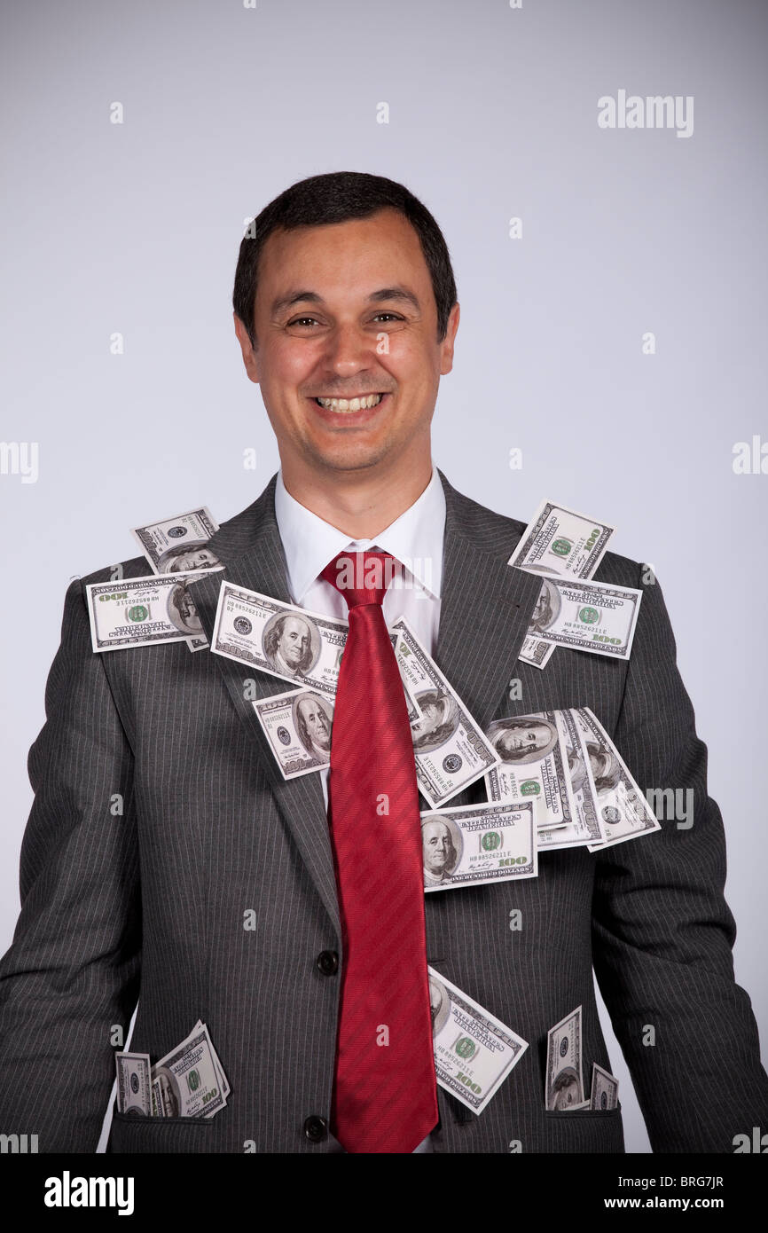 Happy and rich businessman showing all his money Stock Photo - Alamy