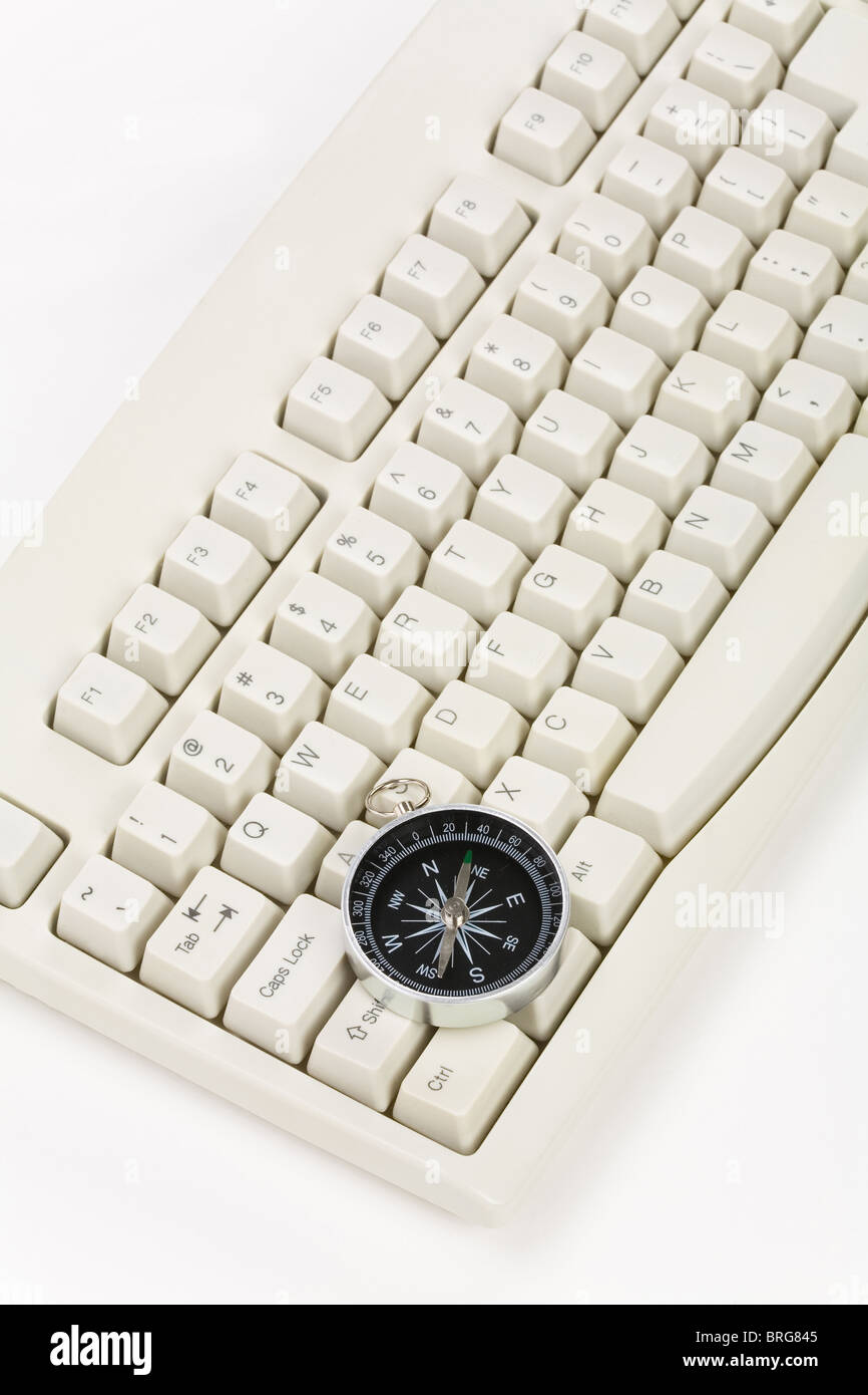 Computer Keyboard and Compass, internet concept Stock Photo - Alamy