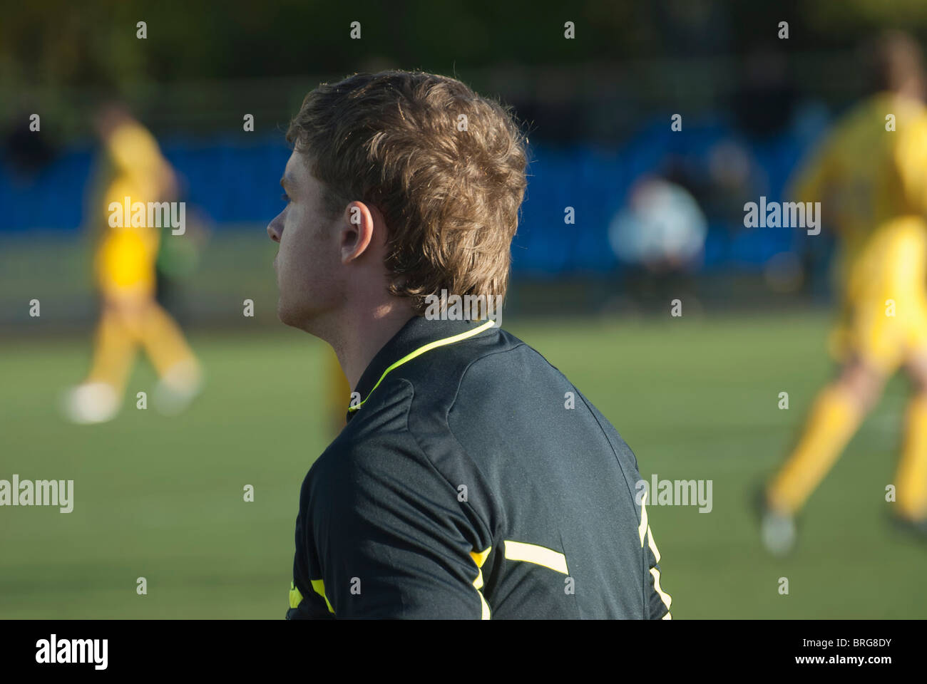 Side referee going along of the pitch border Stock Photo - Alamy