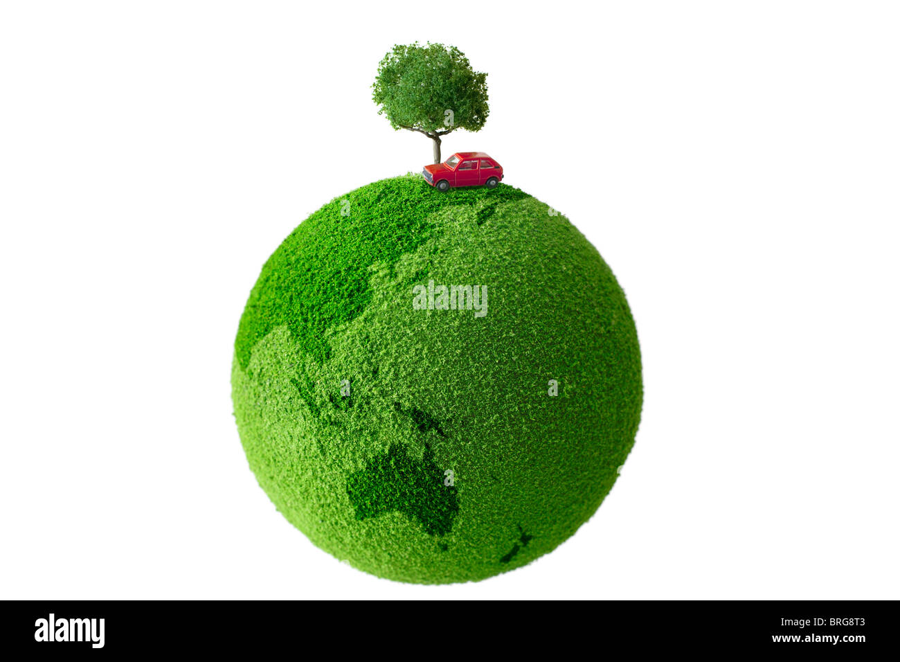 Red car on green earth Stock Photo - Alamy
