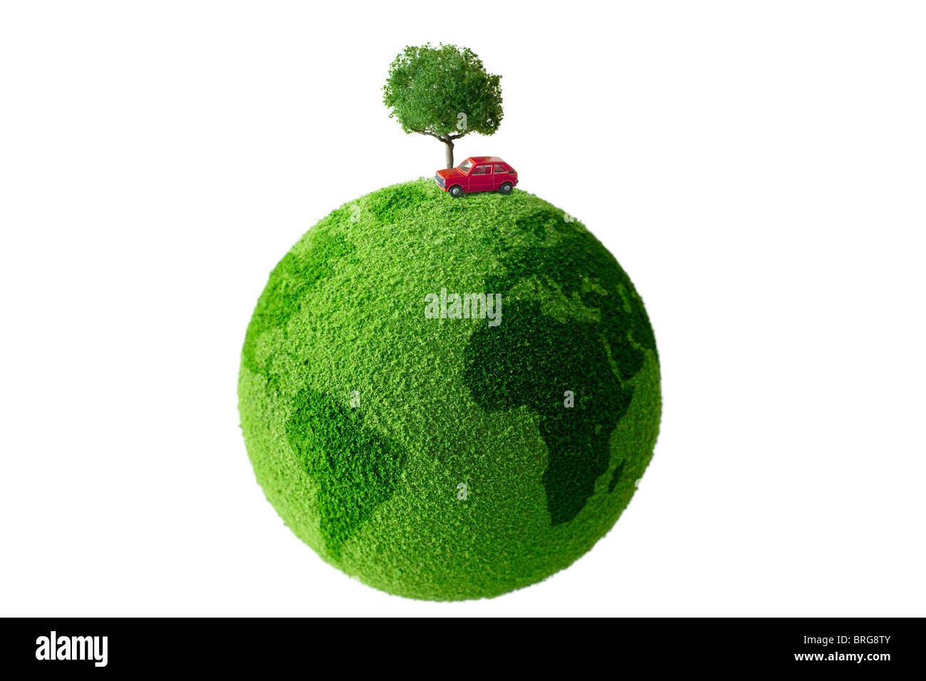 Red car on green earth Stock Photo - Alamy