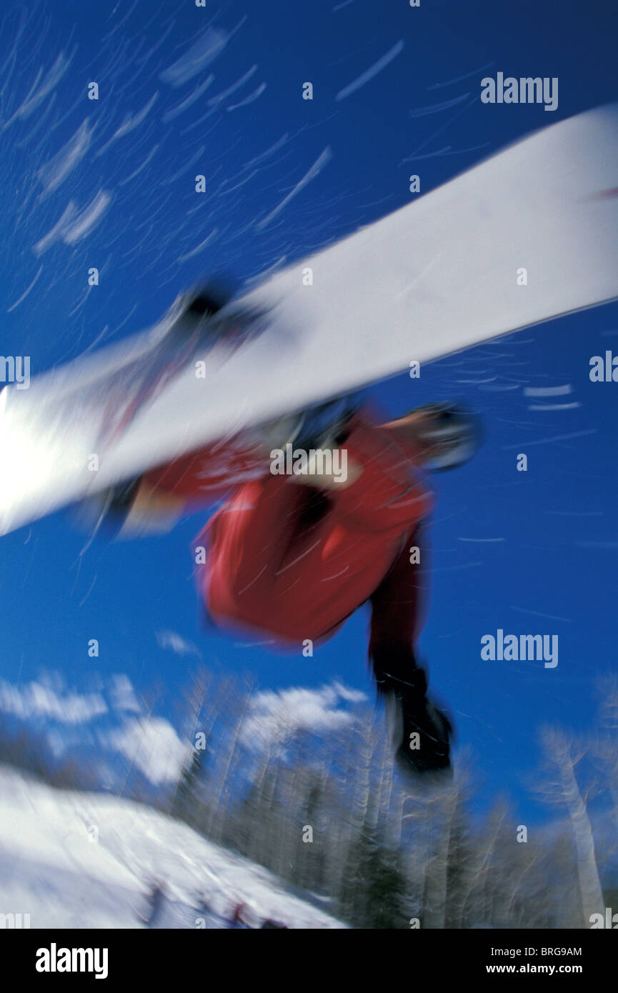 Blurred action of snowboarder Stock Photo - Alamy