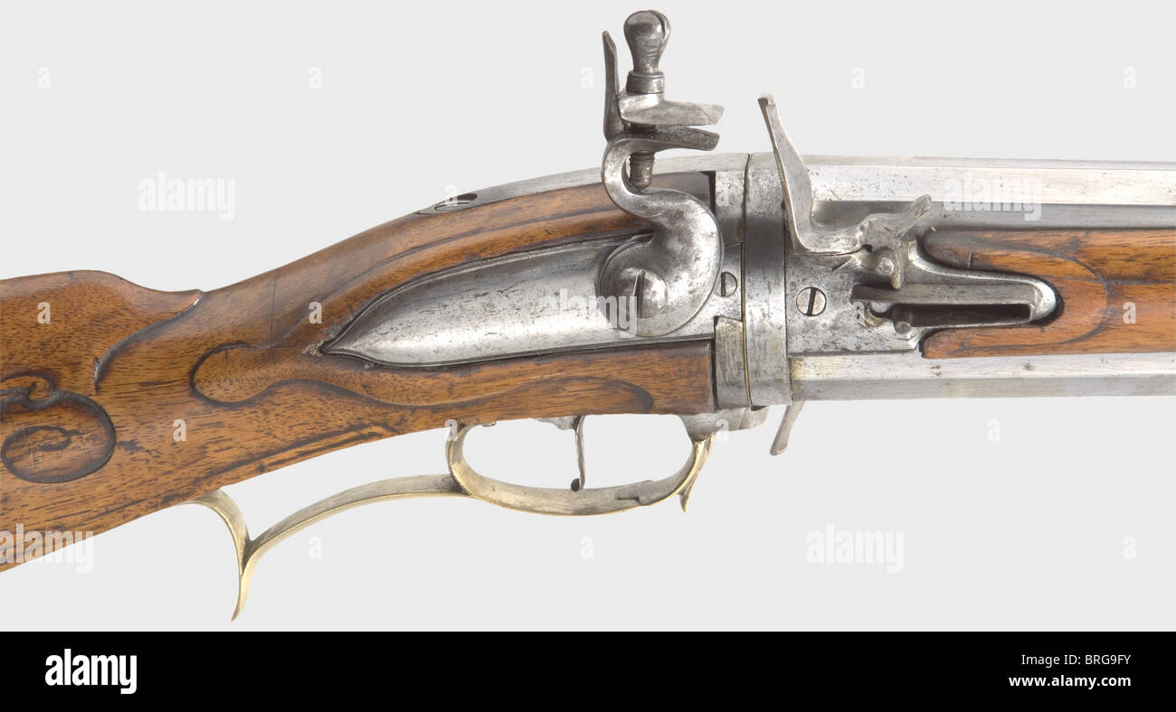 A Southern German flintlock gun with turnover barrels,circa 1780. Two ...