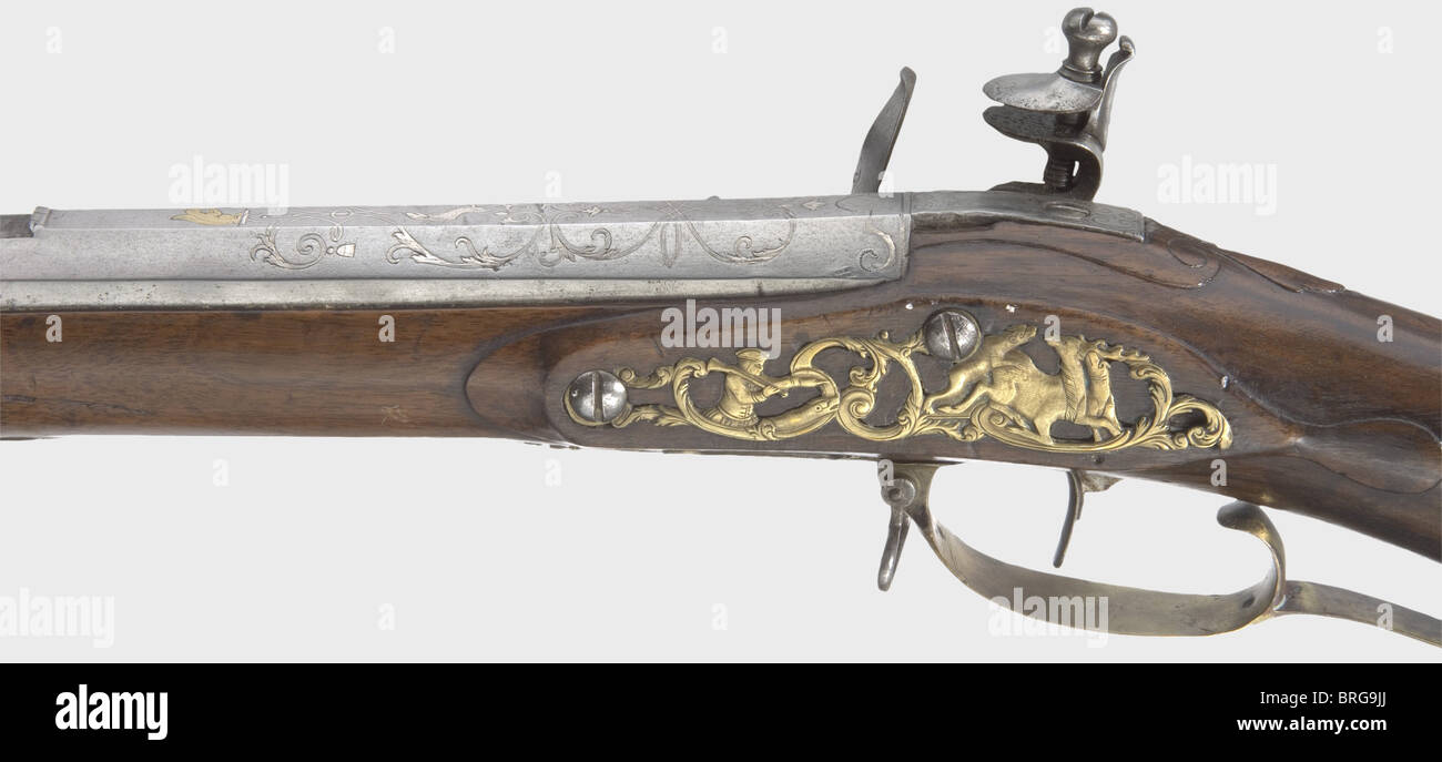 A German flintlock rifle,circa 1730.Slightly swamped octagonal barrel ...