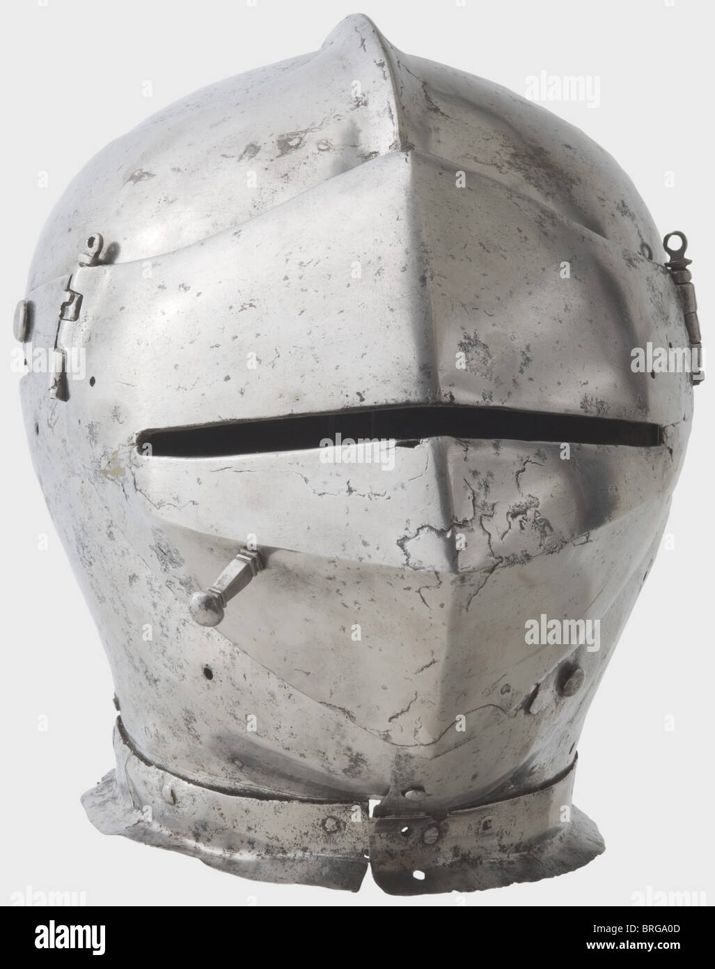 An Italian armet,15th century Hammered,one-piece iron skull with low ...