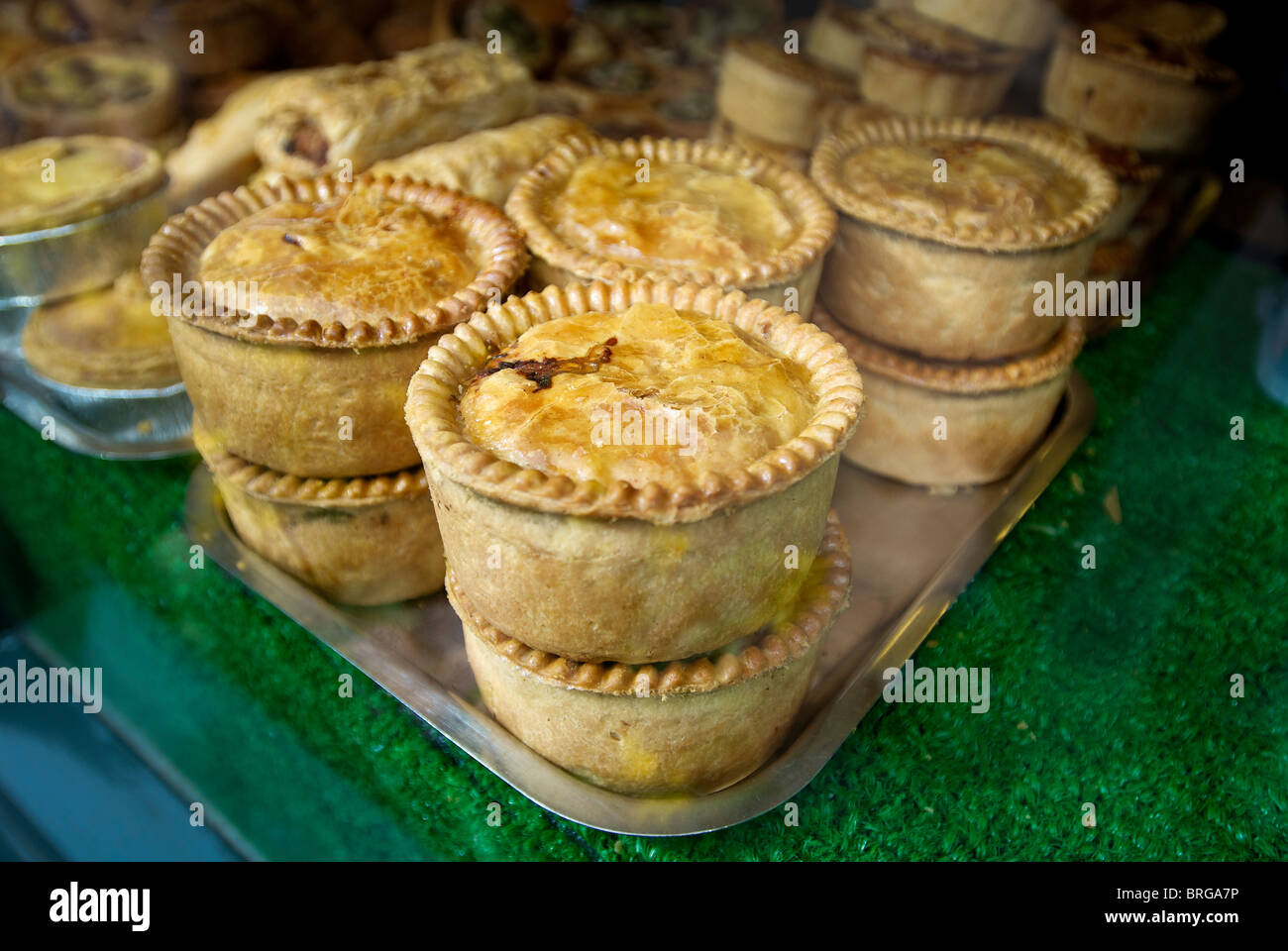 Meat pies in a shop window in Yorkshire Stock Photo - Alamy