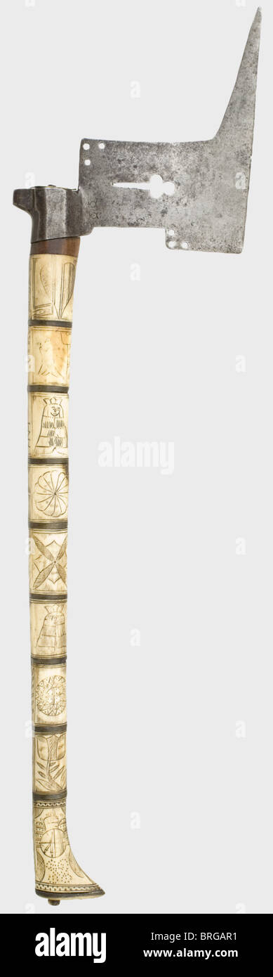 A Saxon miner's axe,dated 1683 Openwork iron blade. Walnut helve ...