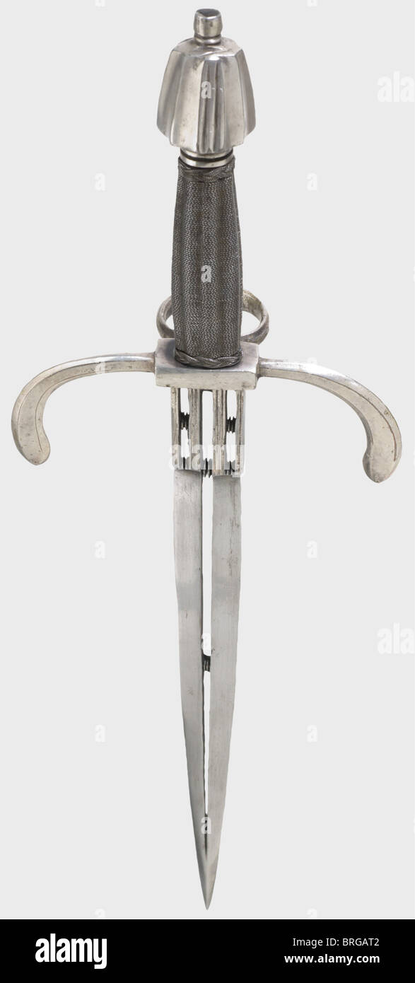 A Saxon left hand dagger,circa 1600 A slender ridged blade with a ...