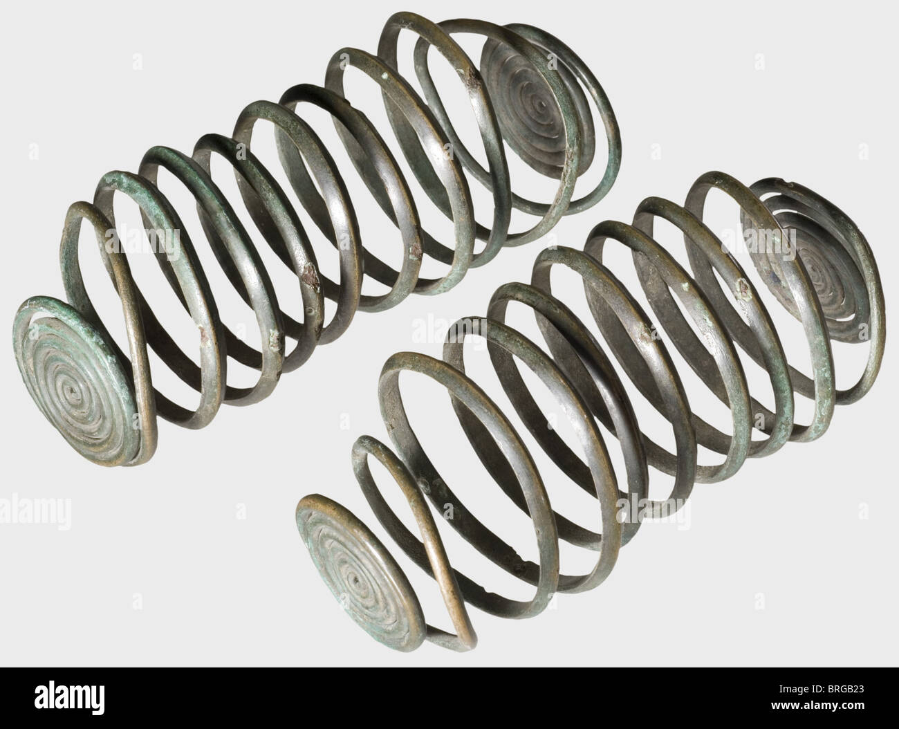 A pair of Central European spiral armlets, Bronze Age, circa 1200 ...
