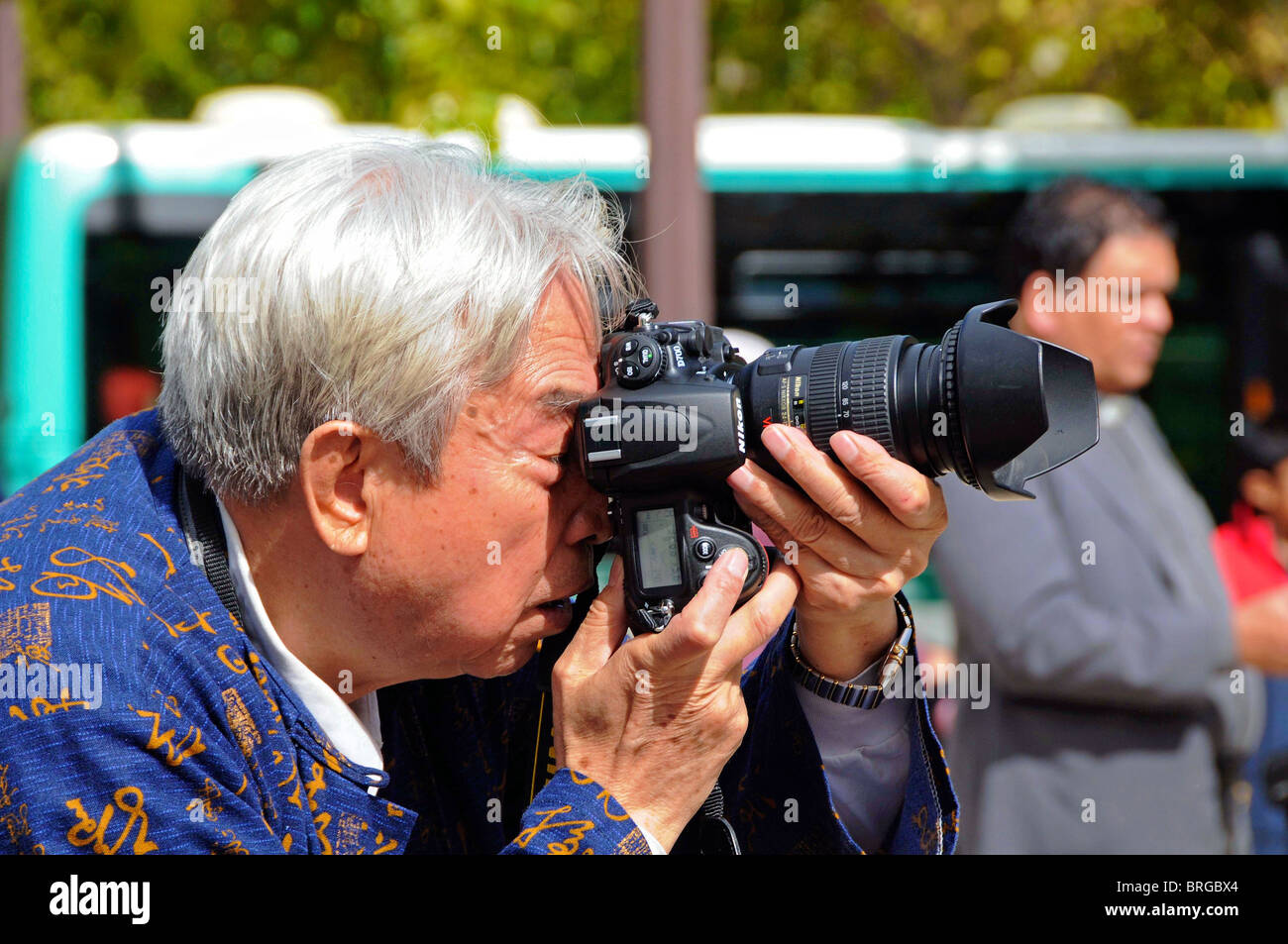 Japanese Tourist With Camera