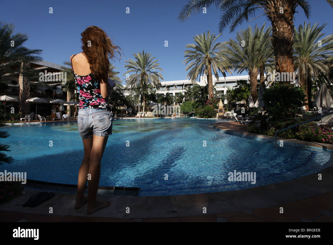 A holidaymaker at the swimming pool of Isrotel Agamim hotel in Eilat a ...
