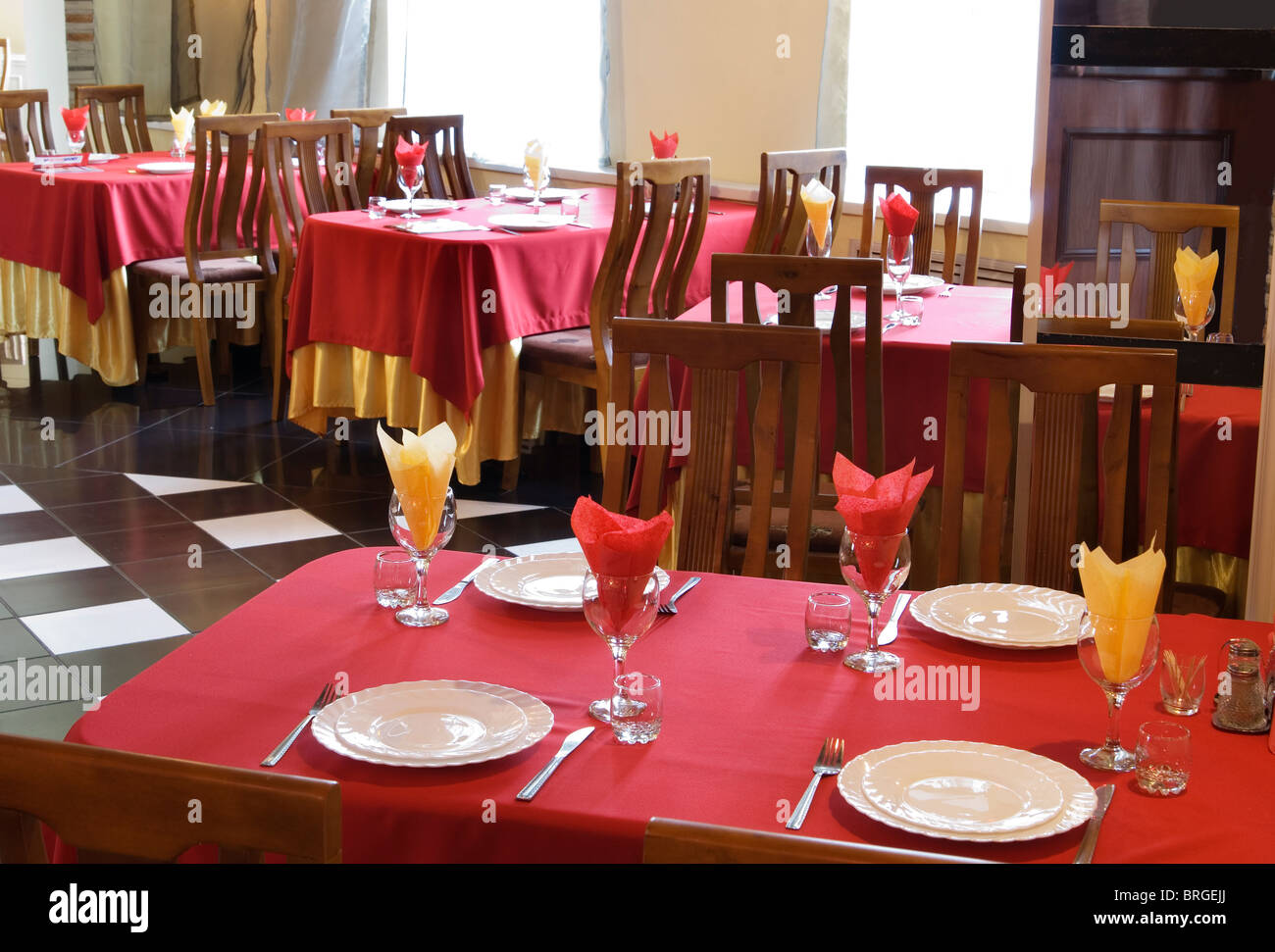 restaurant interior with red and beige tablecloths Stock Photo - Alamy