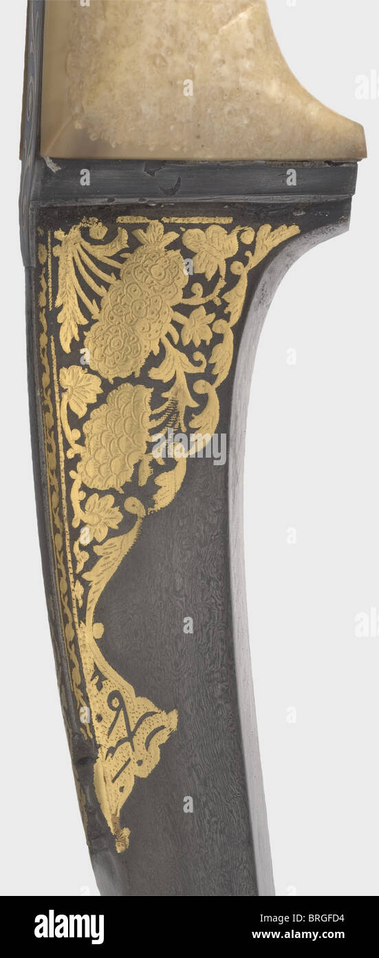 A gold-inlaid Persian pesh kabz, circa 1800 Curved, slightly ridged ...