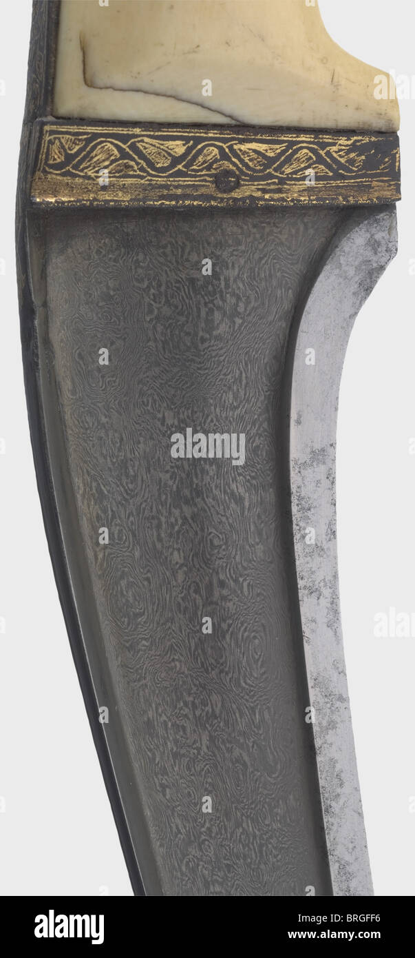 A gold-inlaid Indian pesh kabz, 1st half of the 19th century Curved, T ...