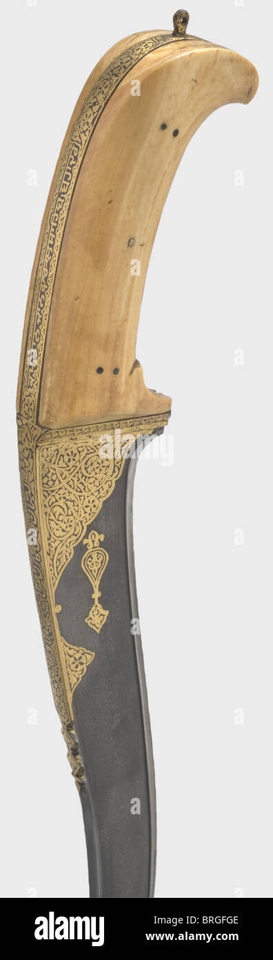 A gold-inlaid Indian pesh kabz,19th century Heavily curved wootz ...