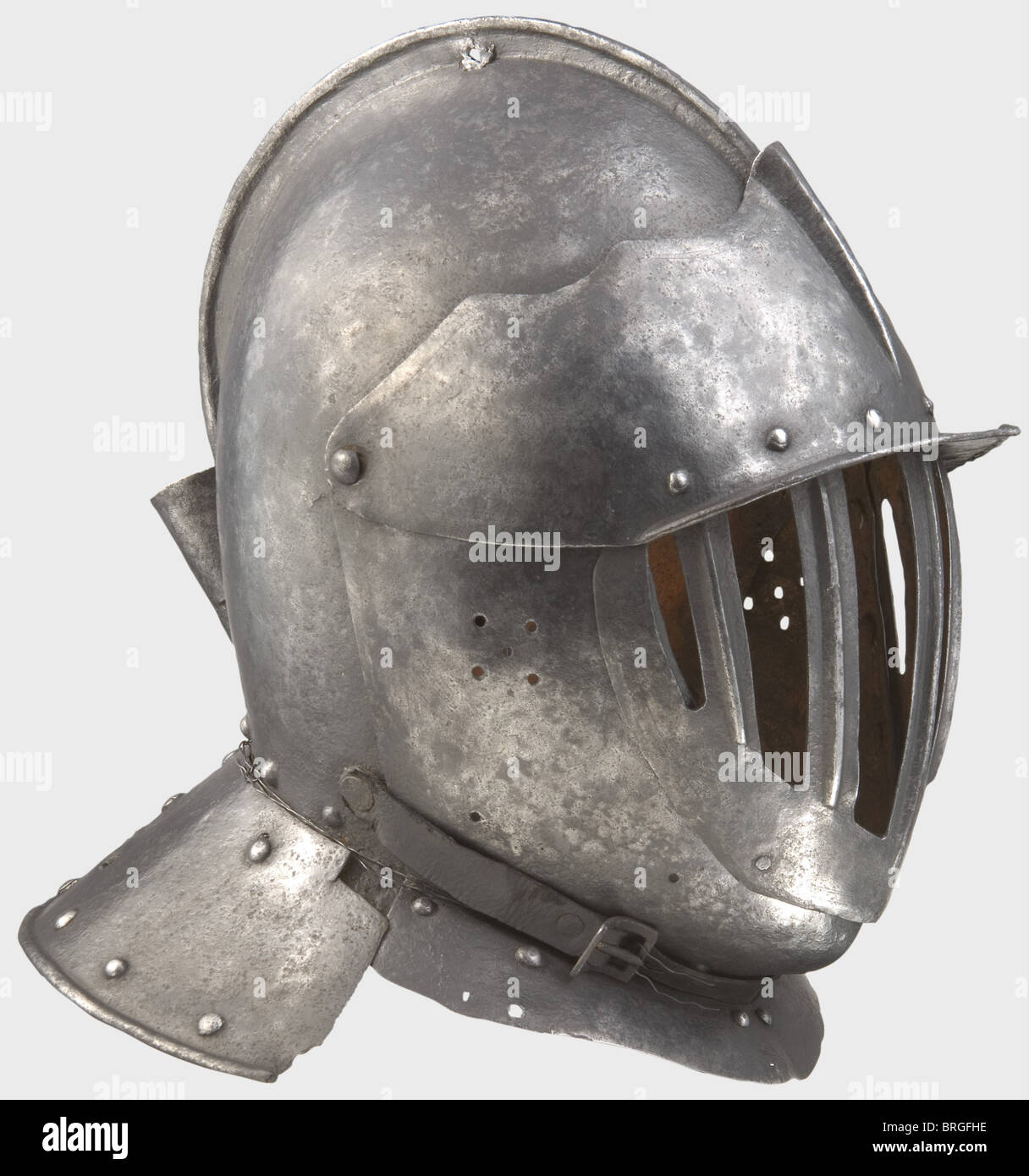 A German cuirassier armet,circa 1620 Two-piece skull with a low turned ...