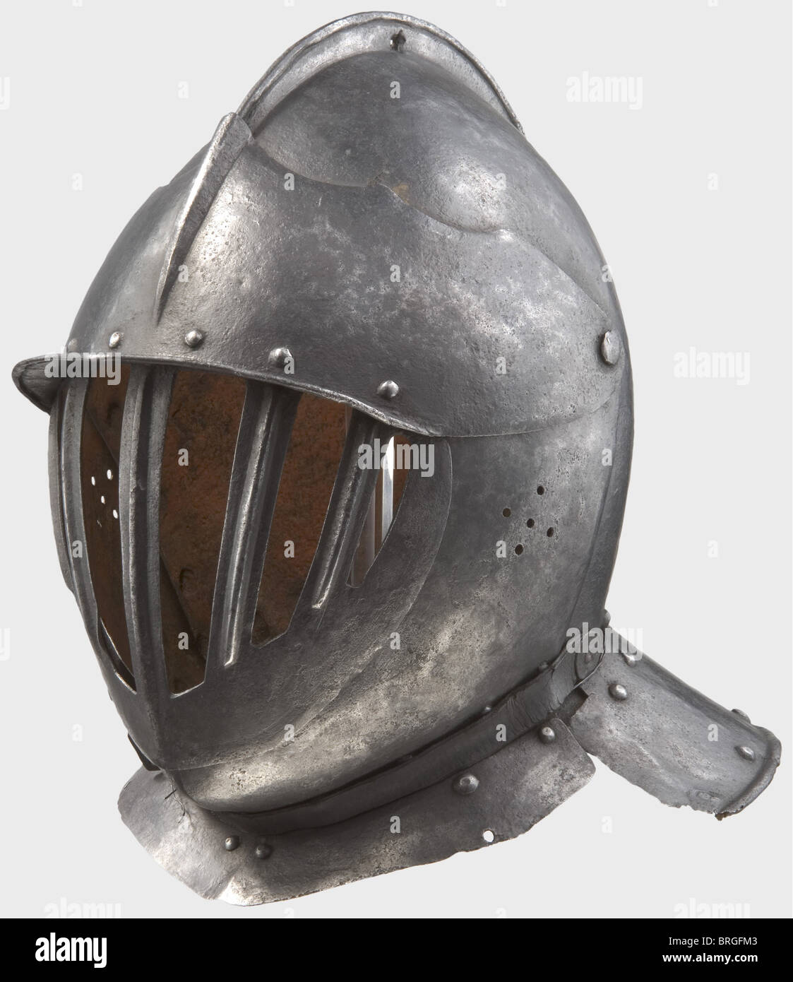 A German cuirassier armet,circa 1620 Two-piece skull with a low turned ...