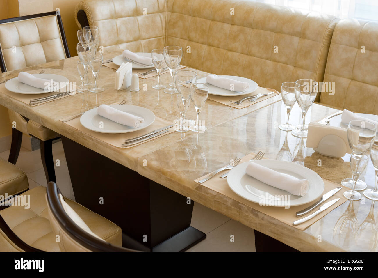 restaurant interior of beige colours with massive expensive furniture ...