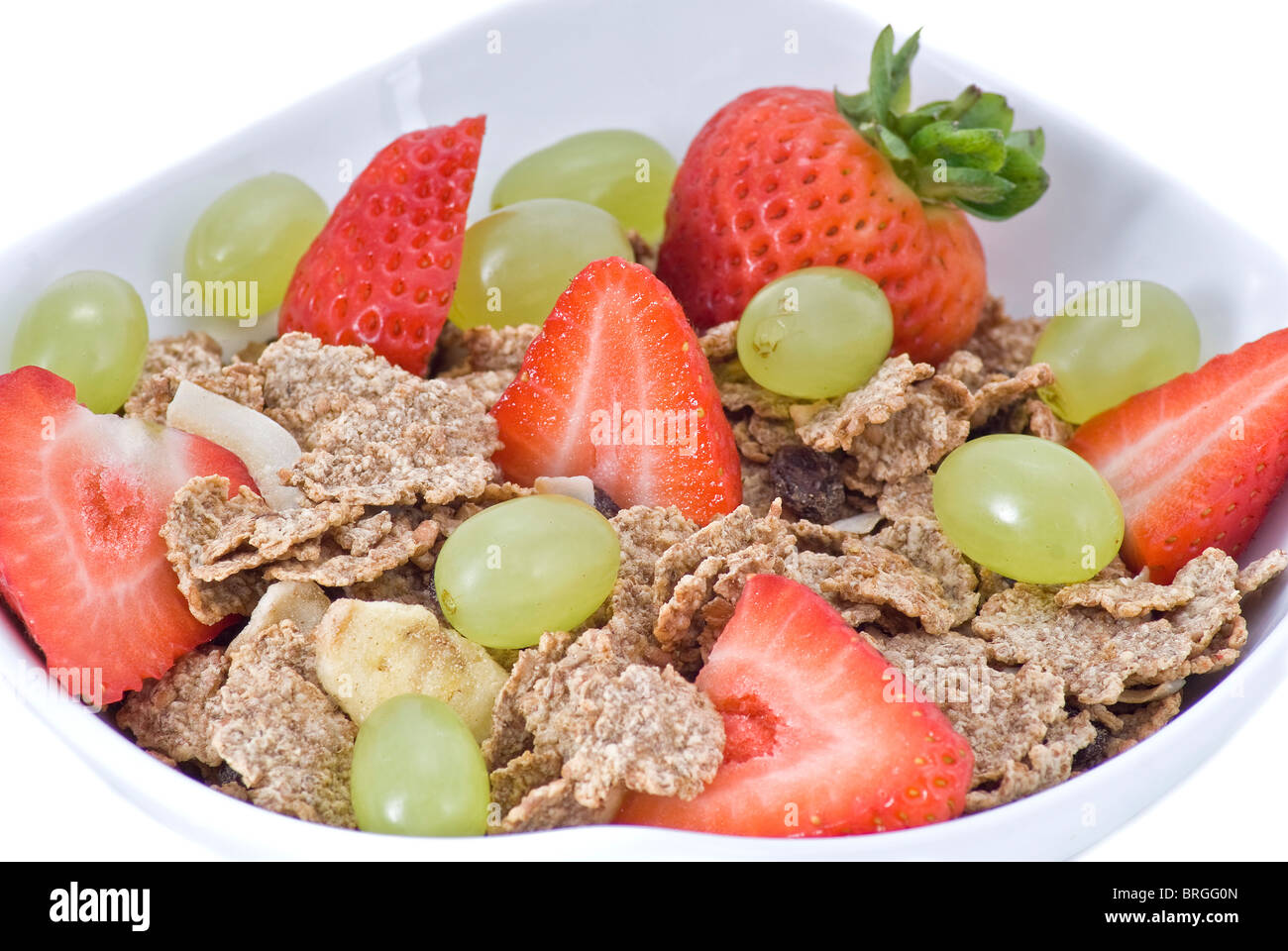 Bowl of corn flakes and fresh fruits Stock Photo - Alamy