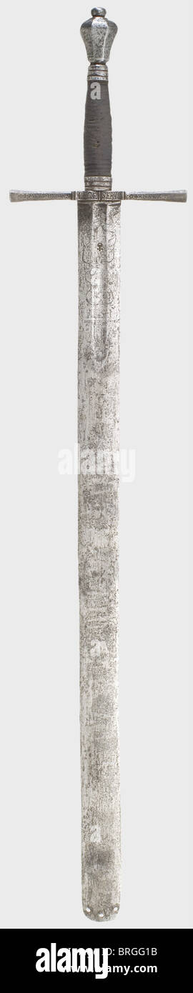 A German executioner's sword,dated 1692 Heavy,double-edged blade with ...