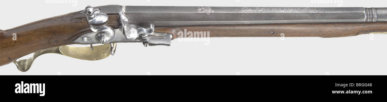 A German flintlock rifle,circa 1780.Two-stage barrel,octagonal then ...
