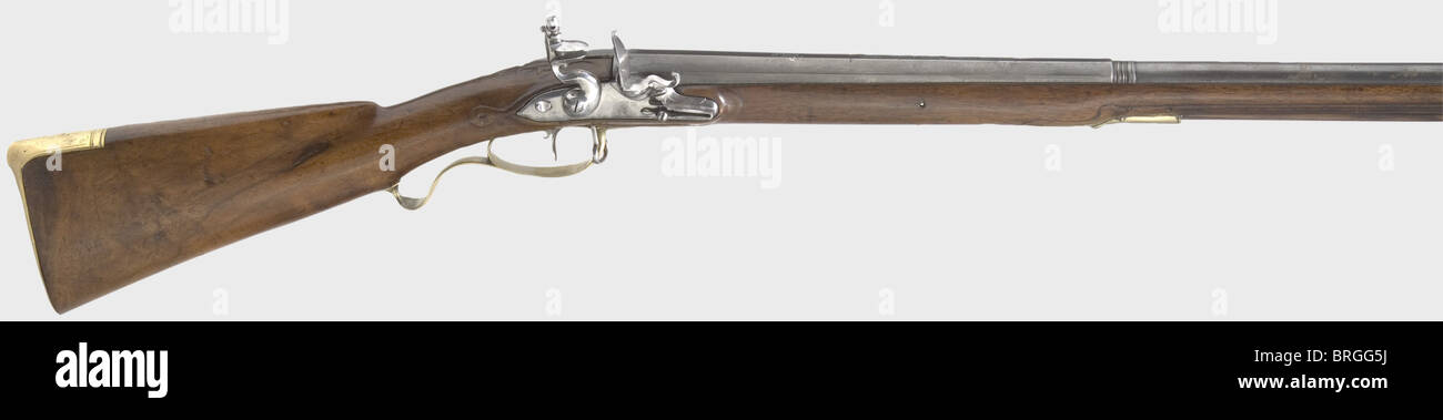 A German flintlock rifle,circa 1780.Two-stage barrel,octagonal then ...