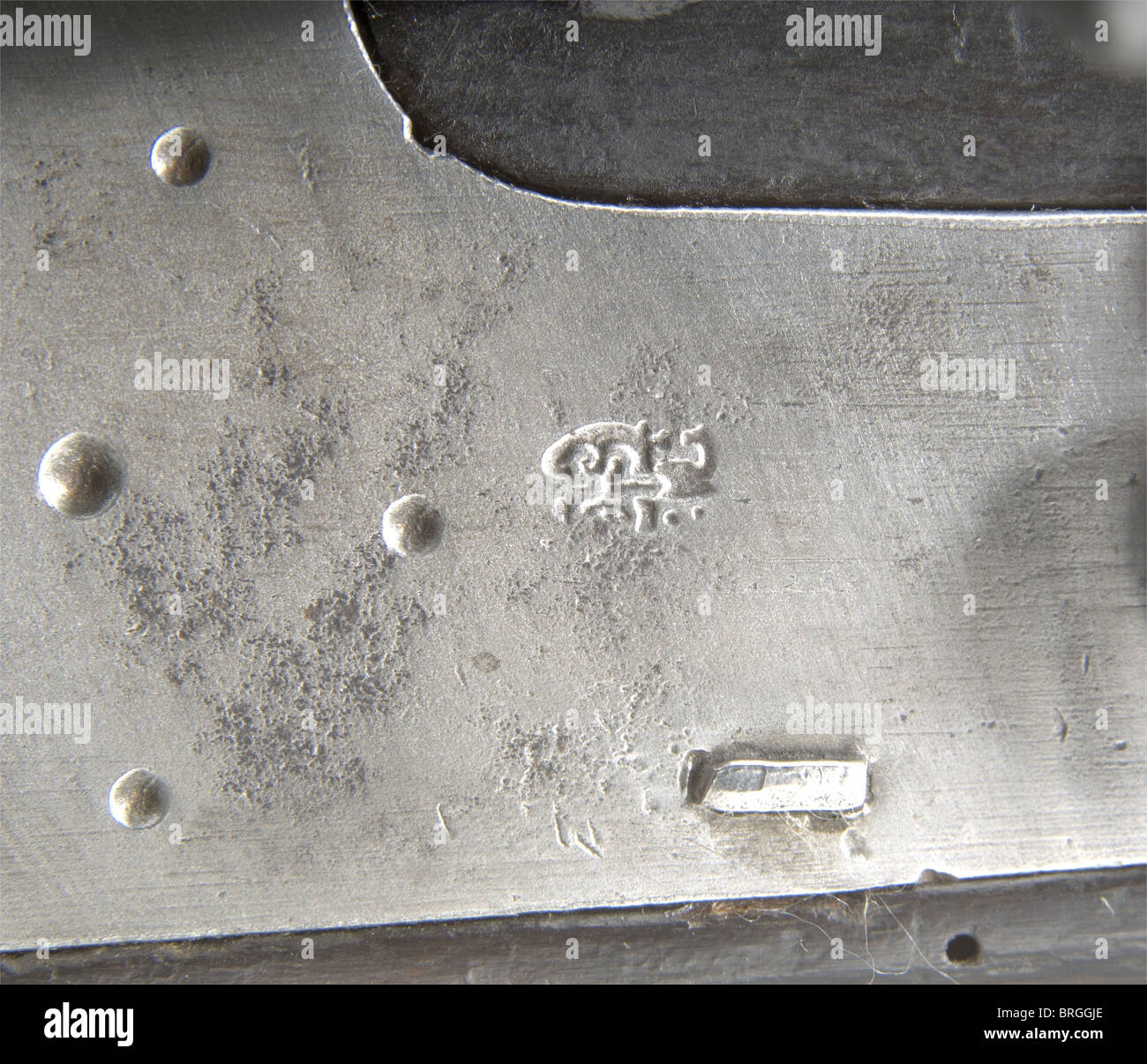 A military matchlock musket,Suhl,circa 1620. Tapered round,smooth bore ...