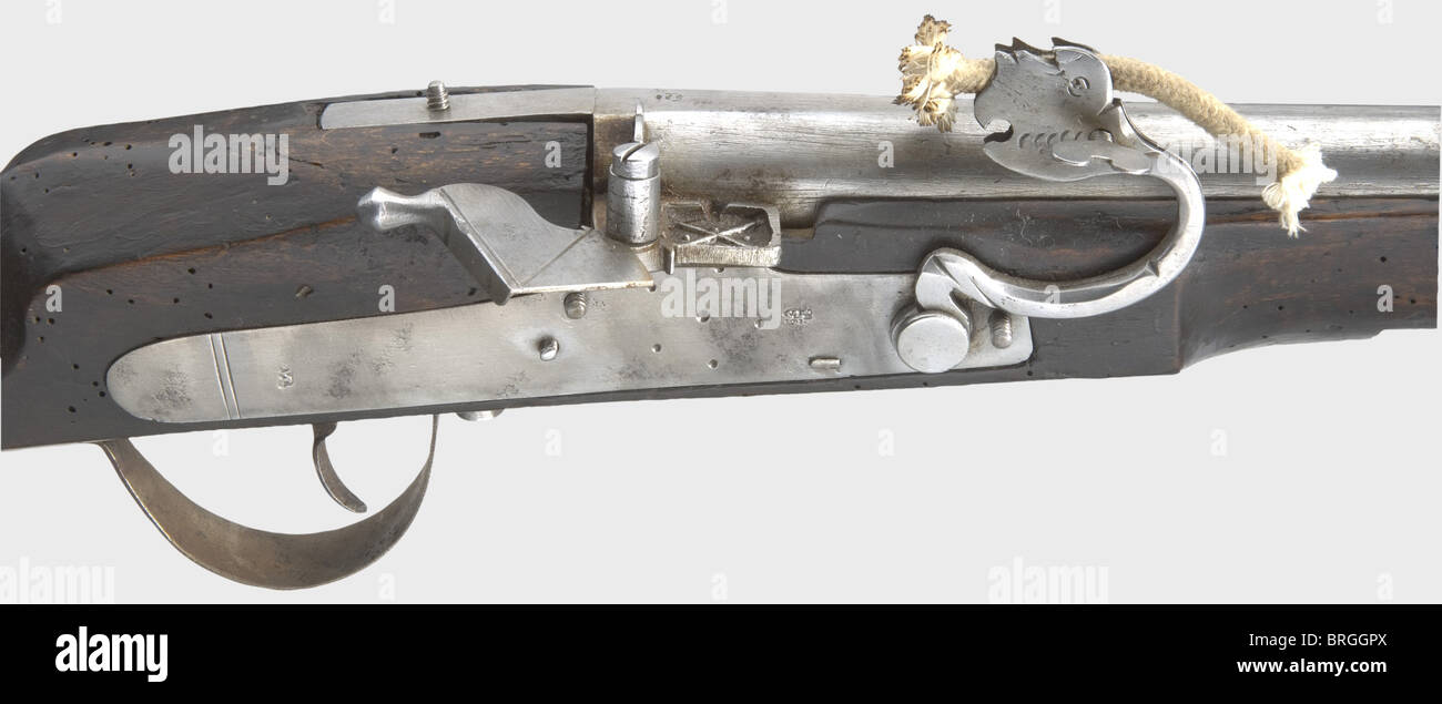 A military matchlock musket,Suhl,circa 1620. Tapered round,smooth bore ...