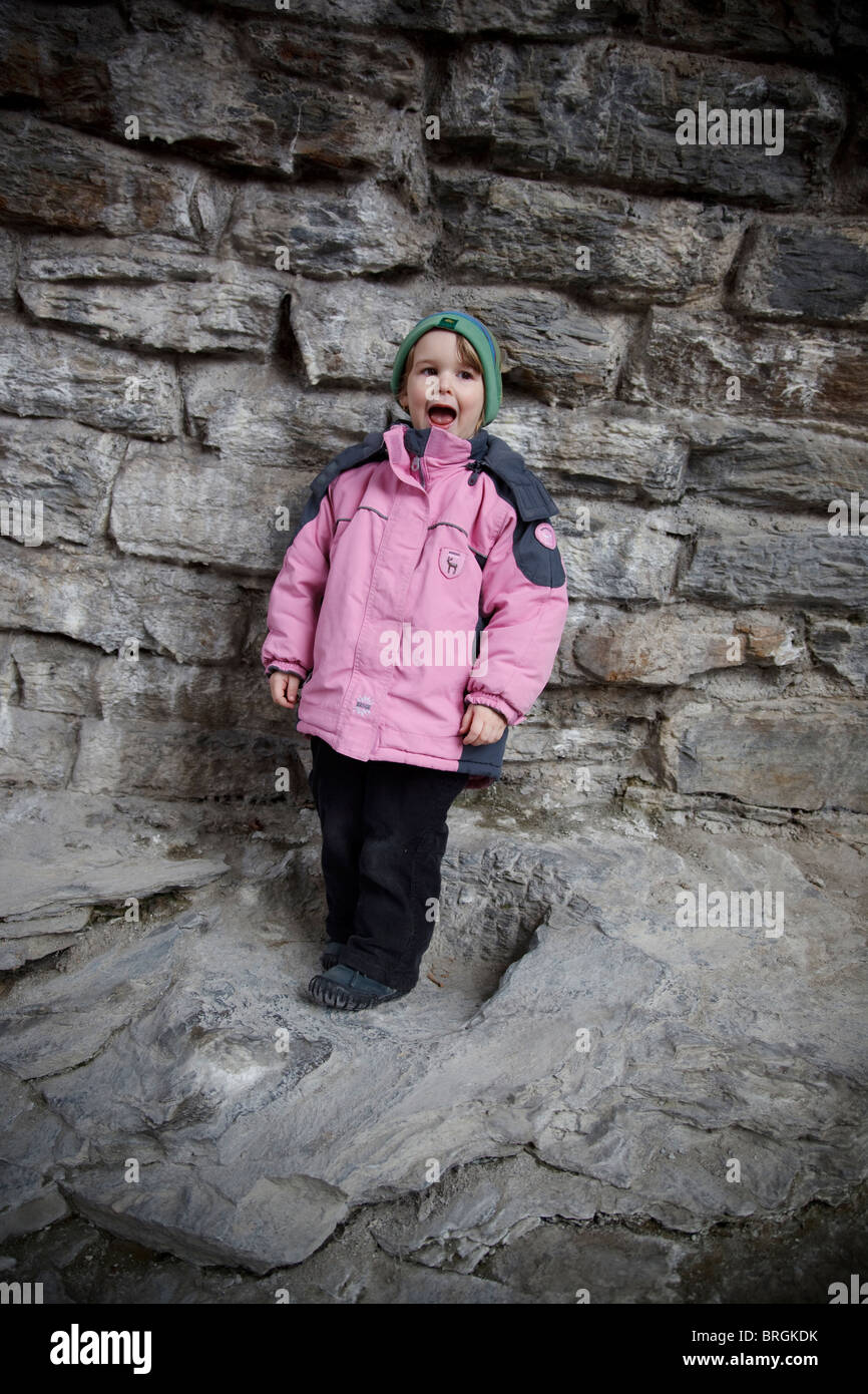 girl posing at wall Stock Photo - Alamy