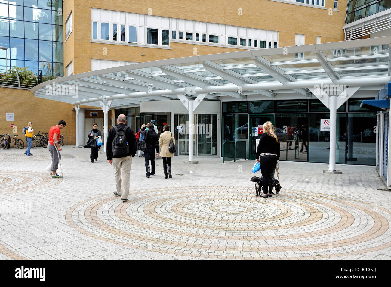 People walking toward the main entrance of the Whittington Hospital ...