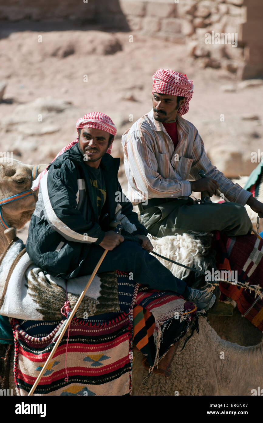 Bedouin camel riders, Petra, Jordan Stock Photo - Alamy