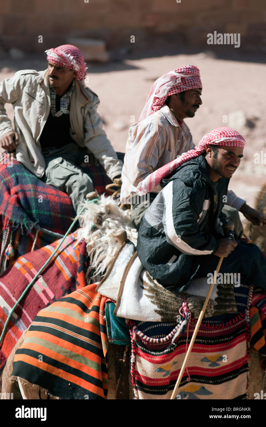 Bedouin camel riders, Petra, Jordan Stock Photo - Alamy