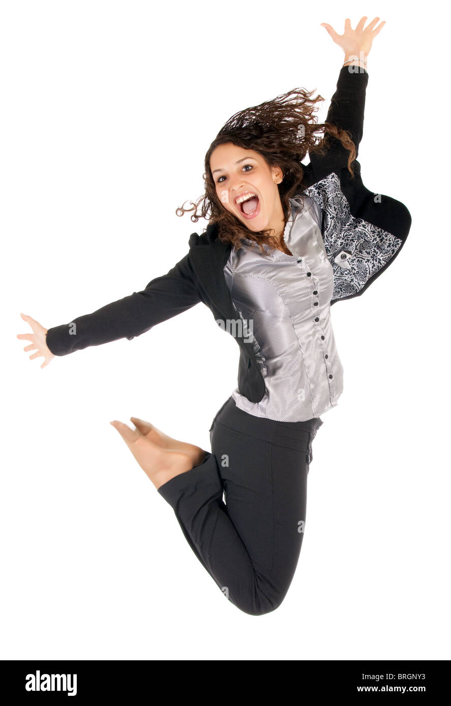 beautiful young business woman jumping over white background Stock ...