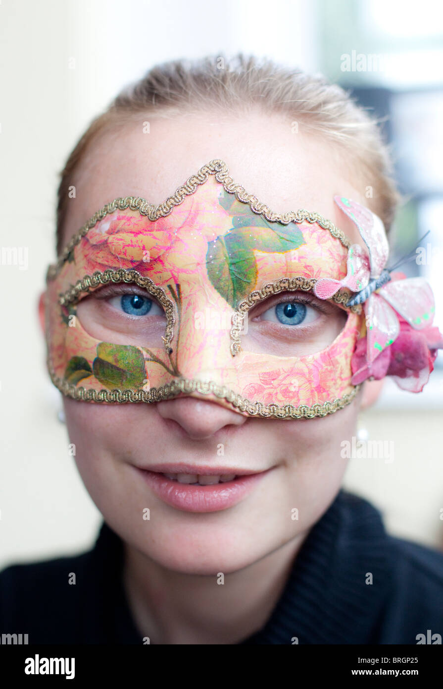 Wearing masquerade mask hi-res stock photography and images - Alamy