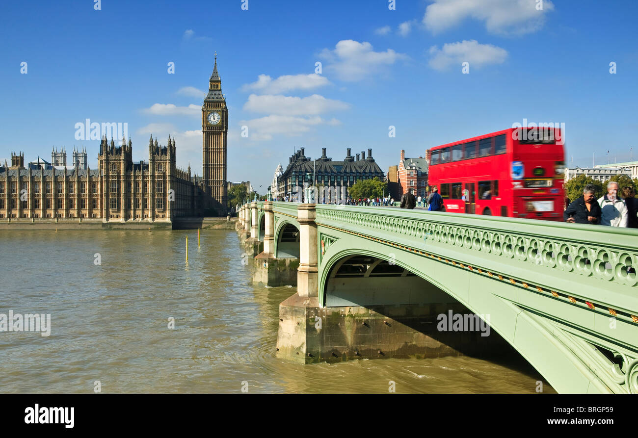 Red London Bus crossing Westminster Bridge, London, England Stock Photo ...