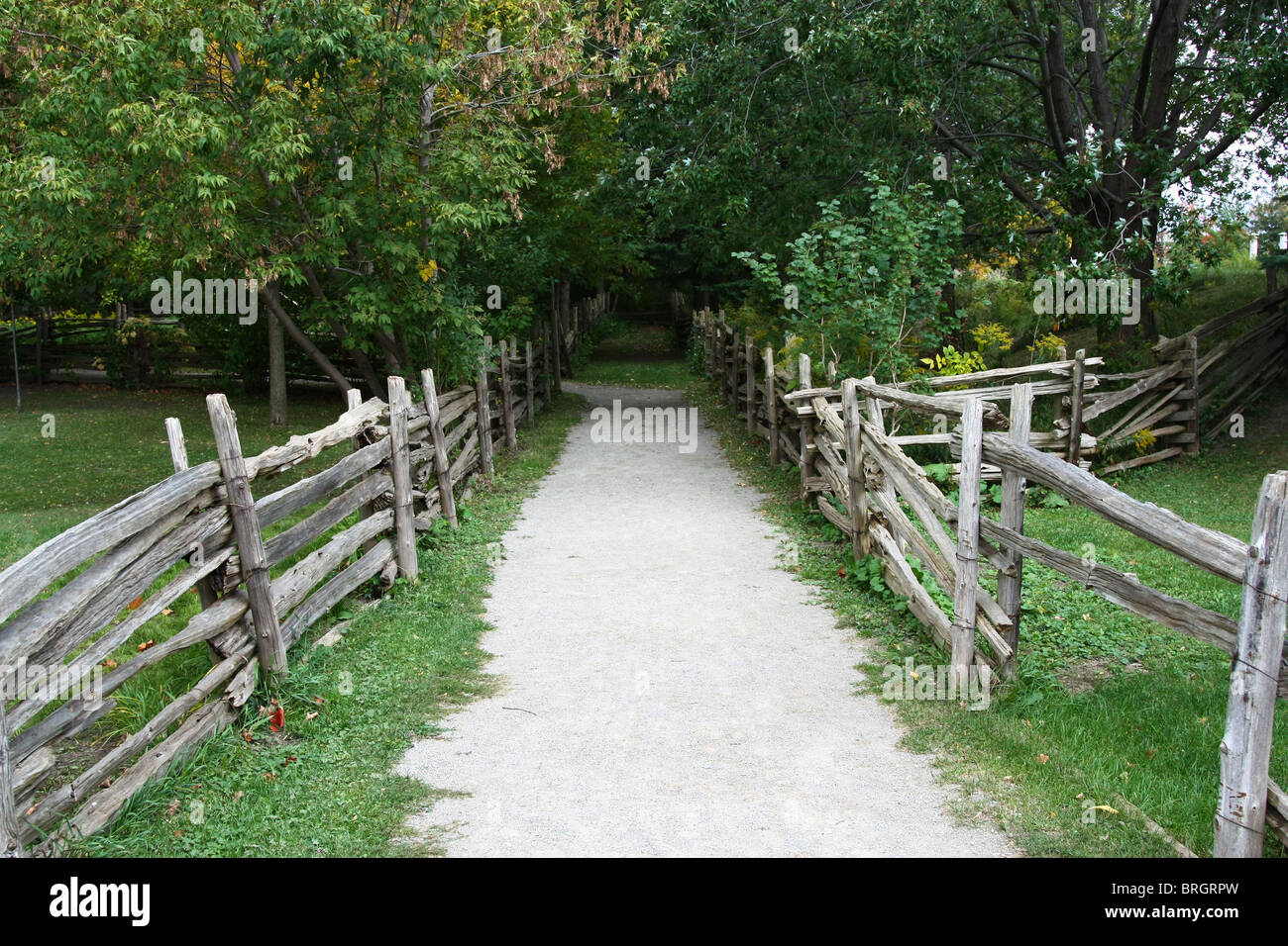 Country road with fence hi-res stock photography and images - Alamy