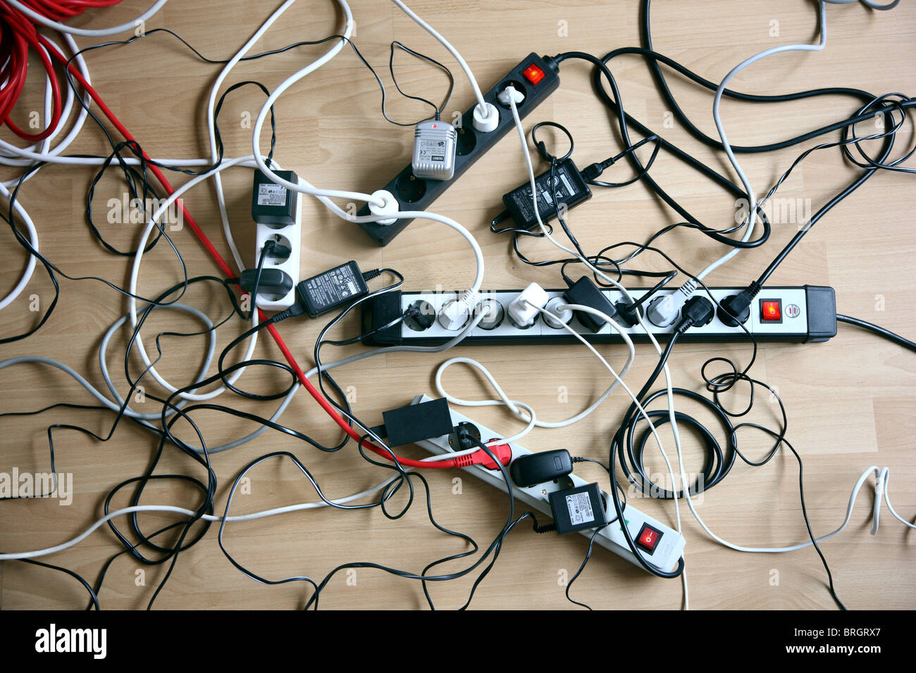 Home electrics, multi socket, power lines, plug board, plugs and ...