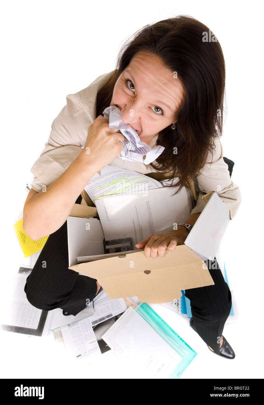 stressed business woman eating papers and documents Stock Photo - Alamy
