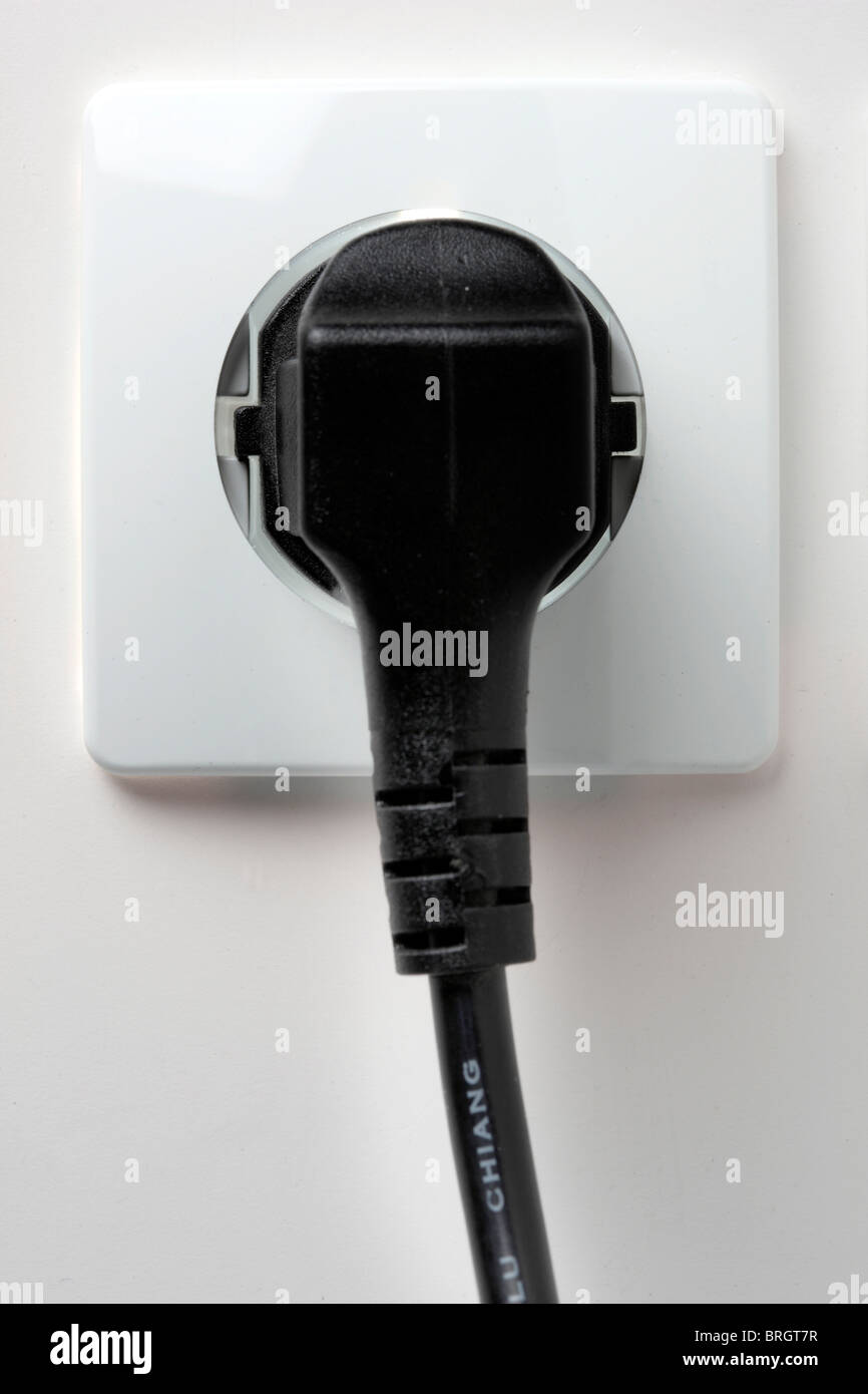 Electric plug and electrical wall socket Stock Photo - Alamy