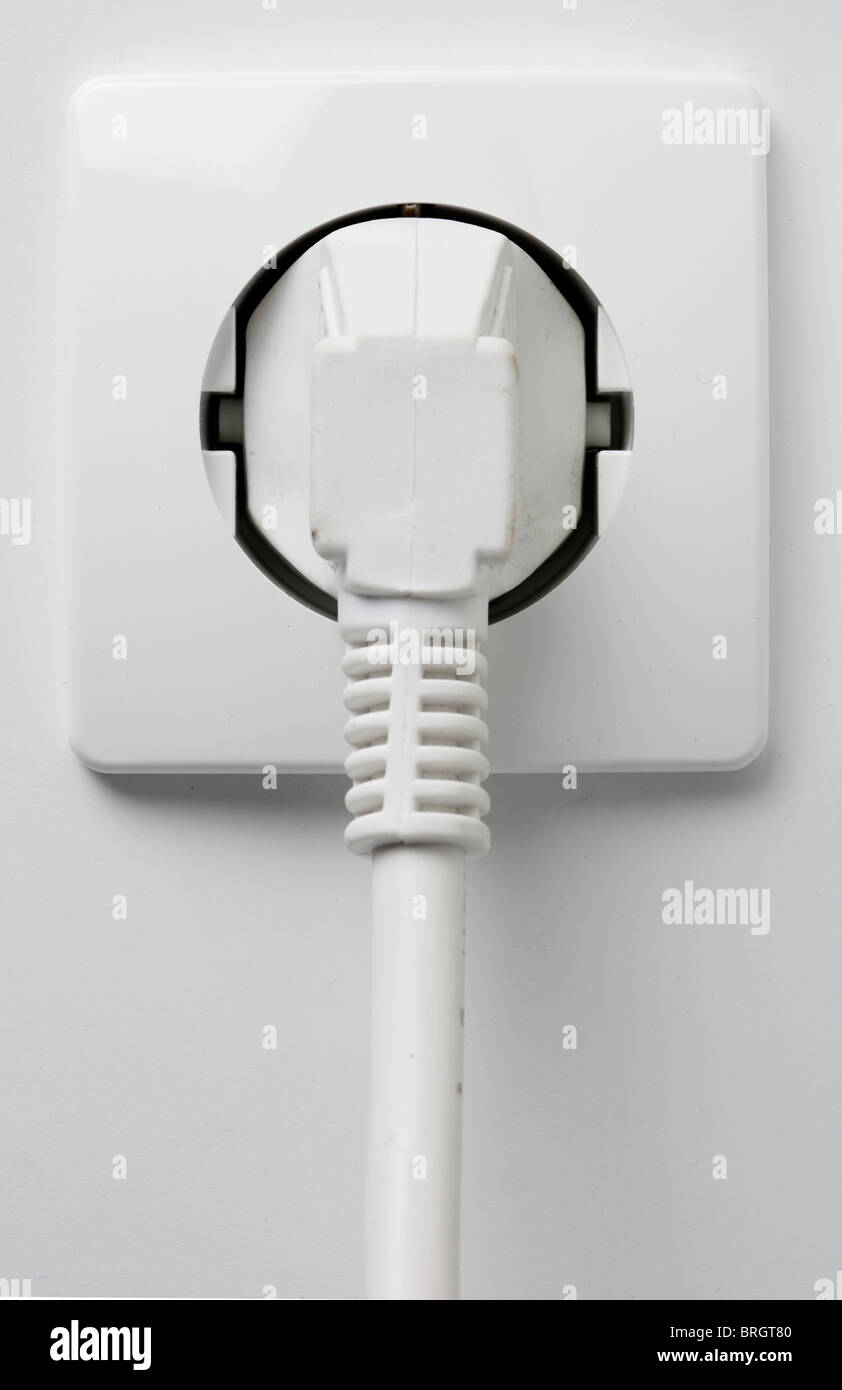 Electric plug and electrical wall socket Stock Photo - Alamy