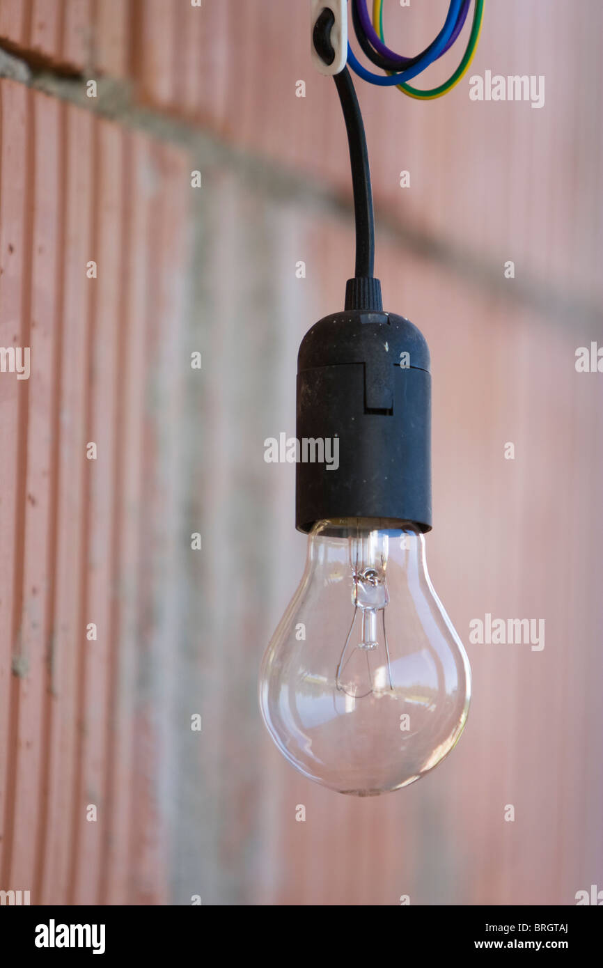 Light bulb at building site Stock Photo - Alamy