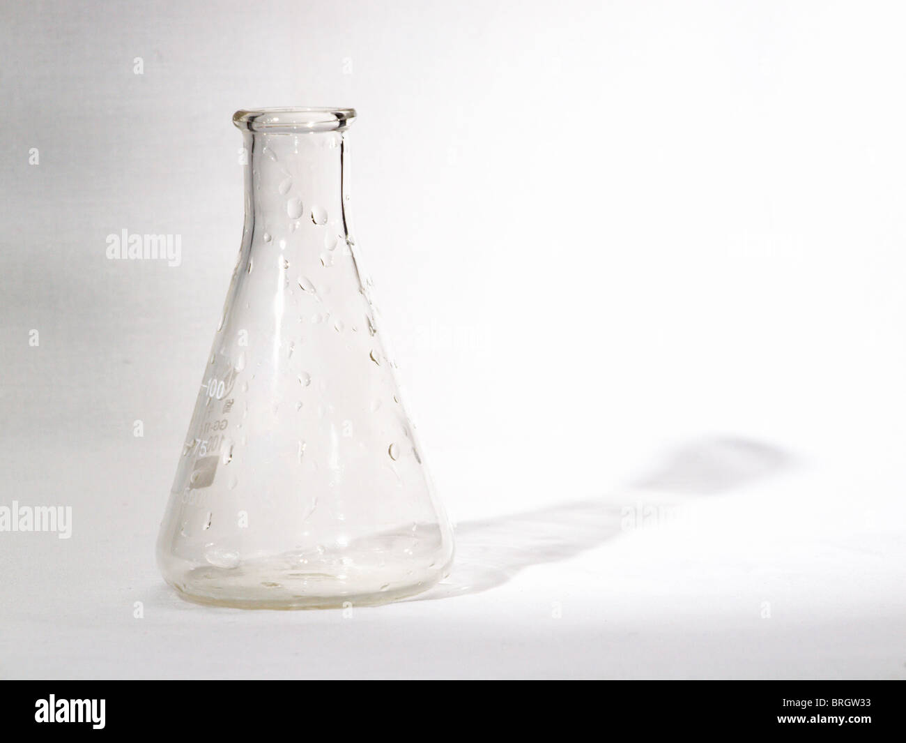 Chemical flask in white Cut Out Stock Images & Pictures - Alamy