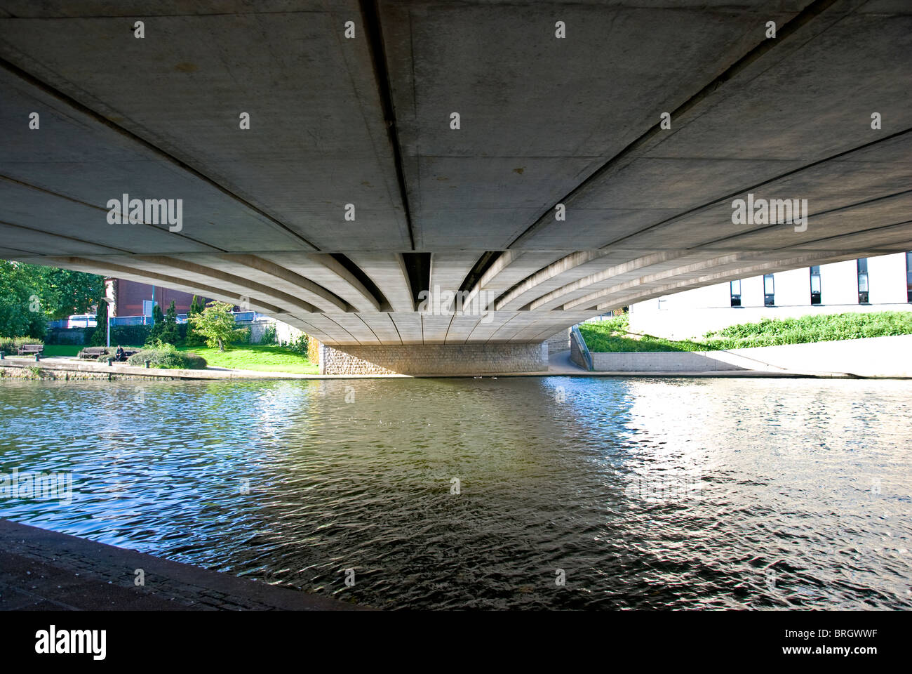 River flowing under a bridge Stock Photo - Alamy