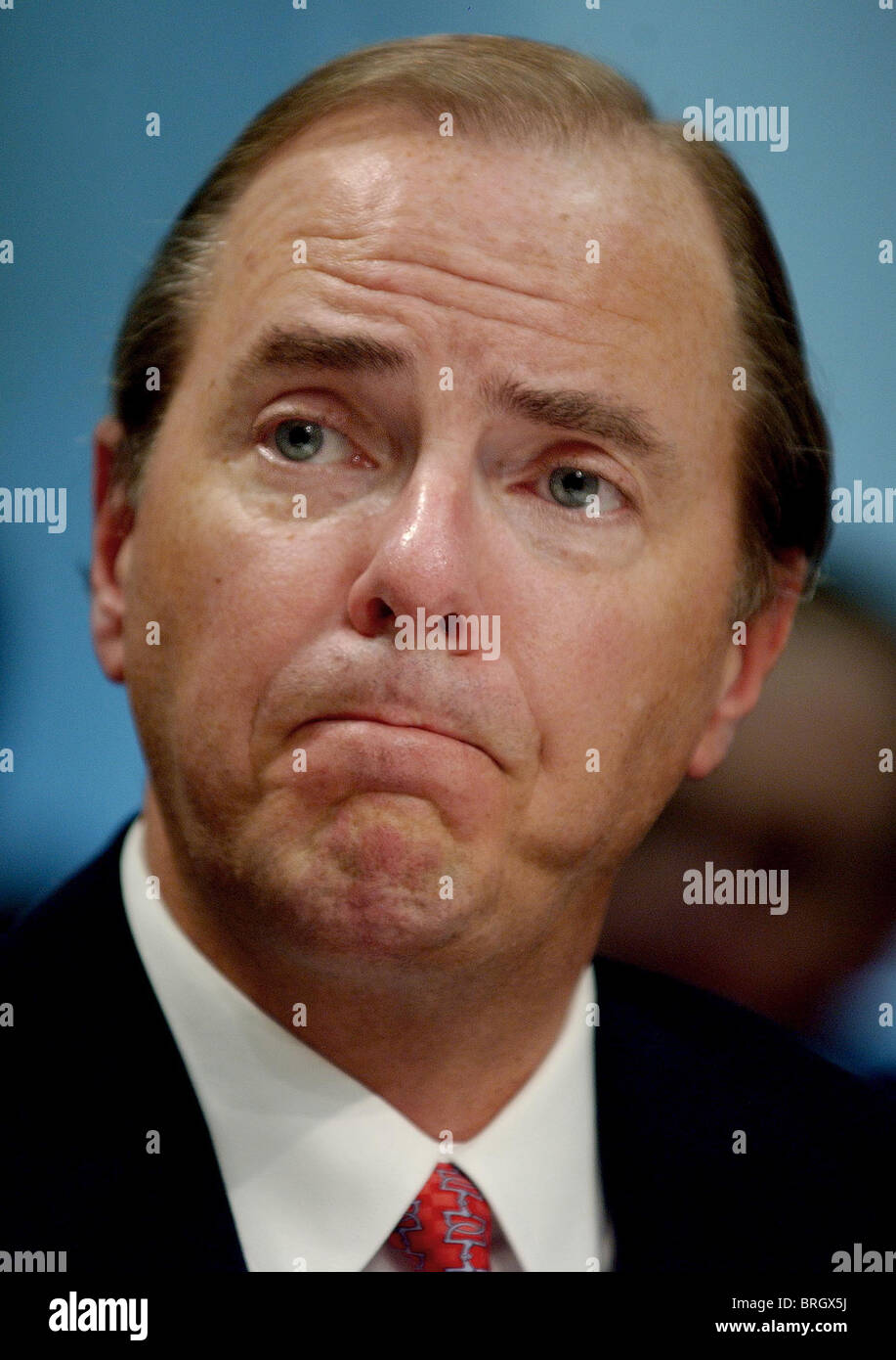 Former Enron Chief Executive Officer Jeffrey Skilling, right, huddles ...