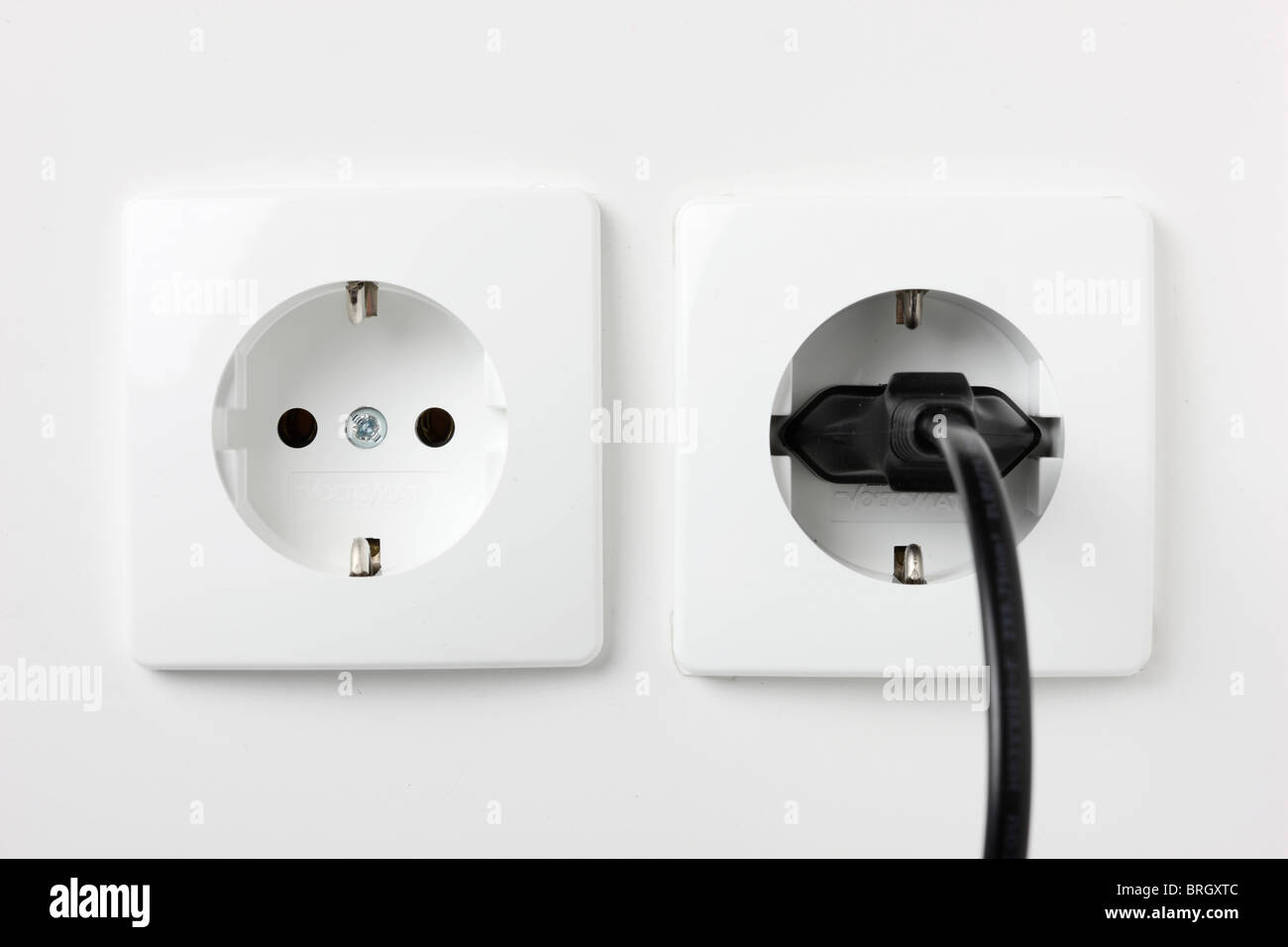 Electric plug and electrical wall socket Stock Photo - Alamy