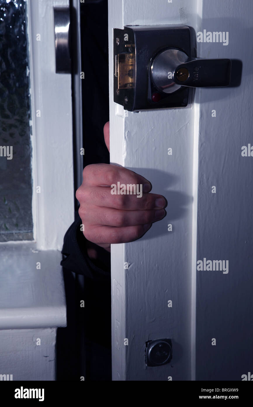 Mans Hand Opening Door