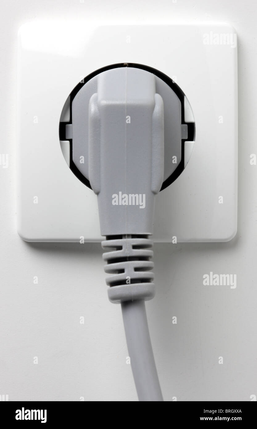 Electric plug and electrical wall socket Stock Photo - Alamy