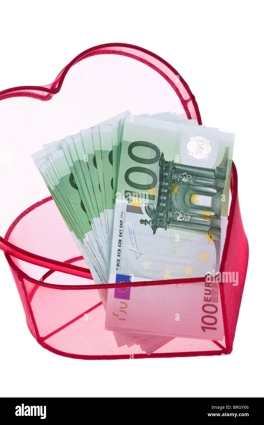 Many Euro notes with heart Stock Photo - Alamy