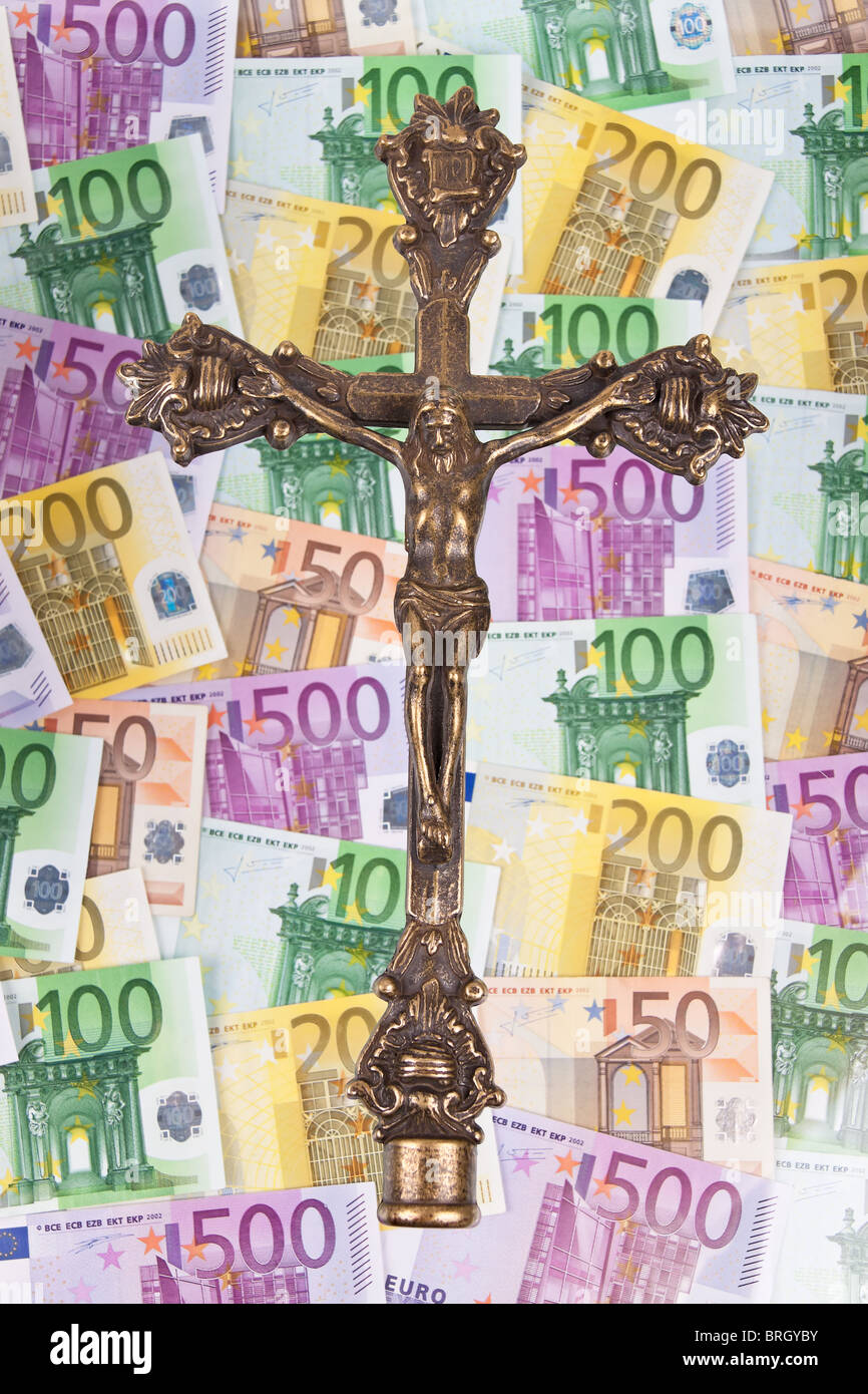 Many Euro bank notes with a cross Stock Photo - Alamy